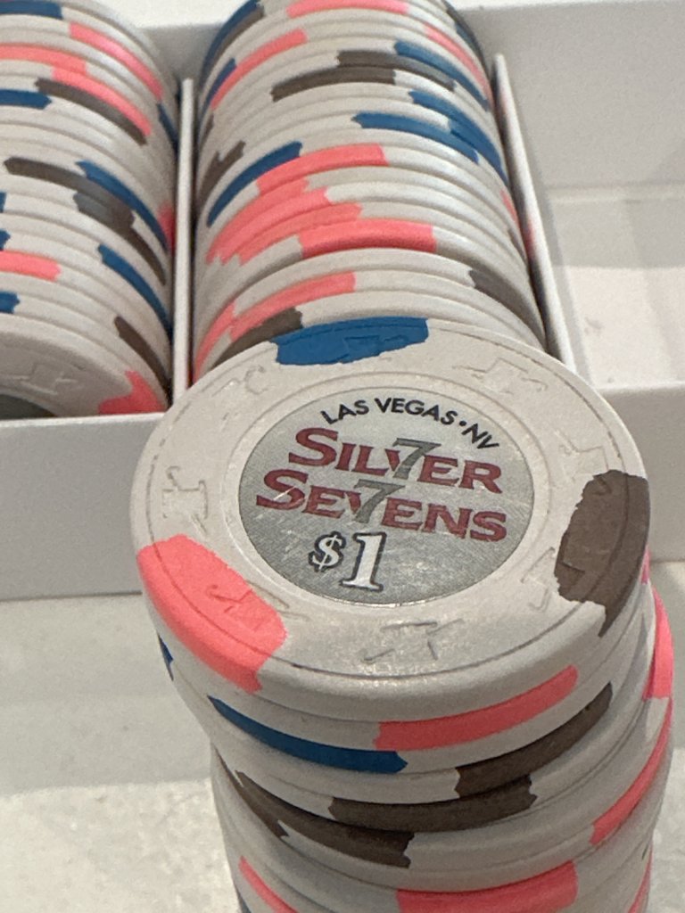 Sold - 101 x silver sevens $1 chips. Used. Bright SPOTS! 1 day auction ...